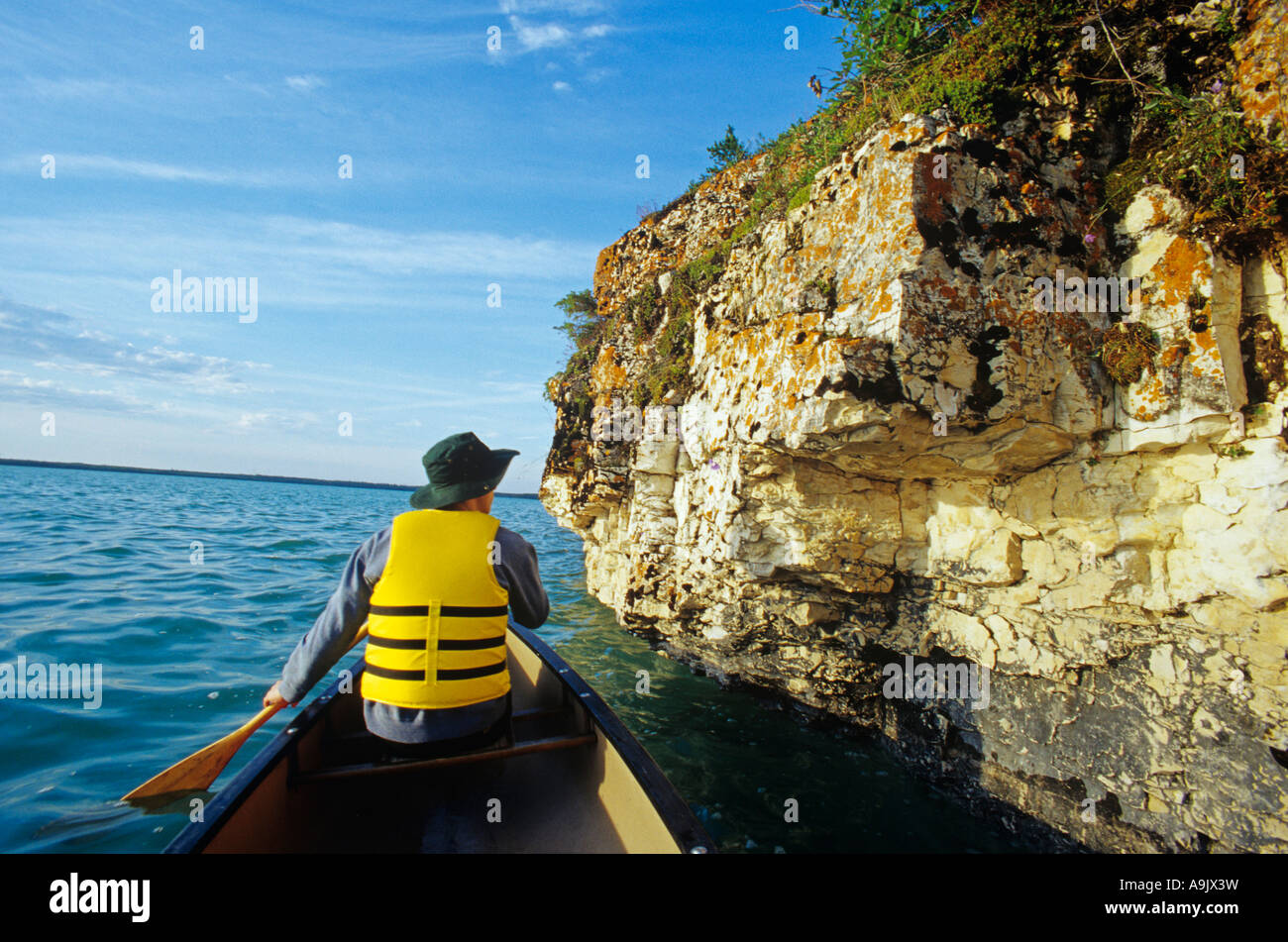 canoeing near limestone cliffs, Little Limestone Lake, Manitoba, Canada ...