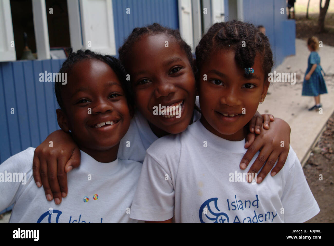 Portrait of three children posing for the camera Stock Photo - Alamy