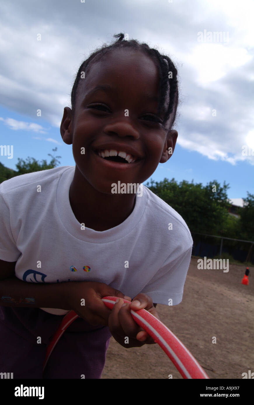 Kids playing with hula hoops hi-res stock photography and images - Alamy