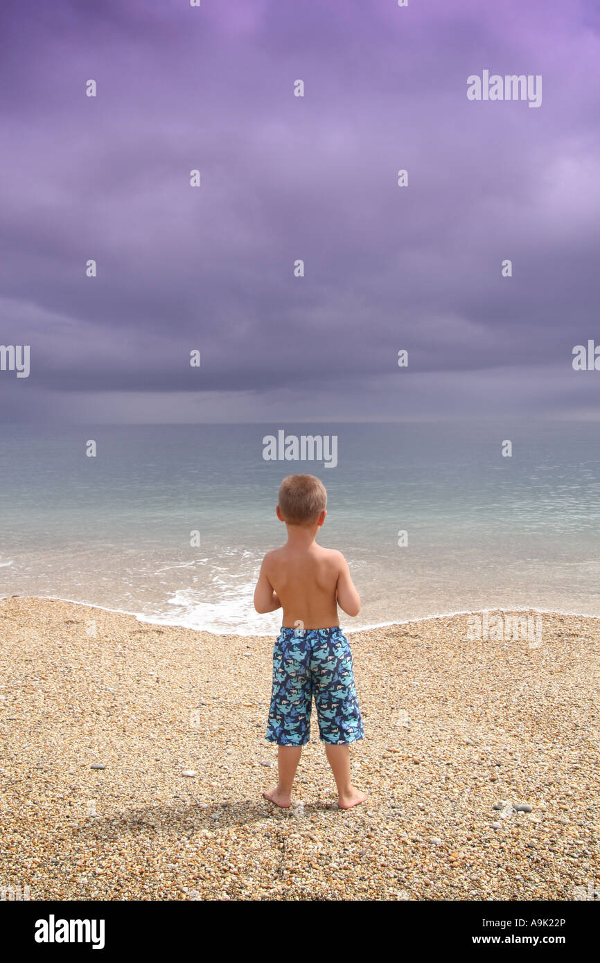 boy looking out to sea Stock Photo - Alamy