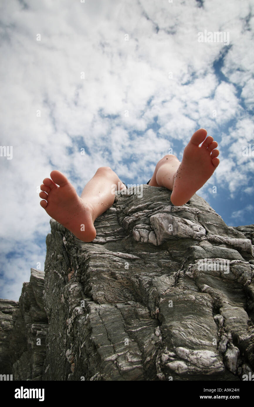 Feet on rocks hi-res stock photography and images - Alamy