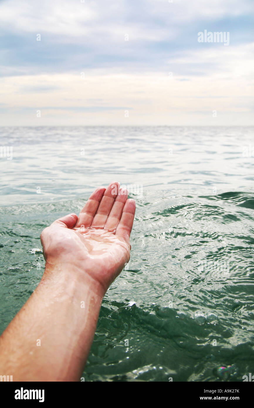 outstretched arm on water Stock Photo - Alamy