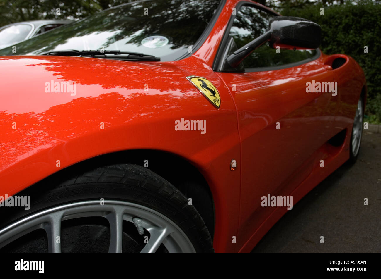 Red Ferrari close up detail Stock Photo - Alamy