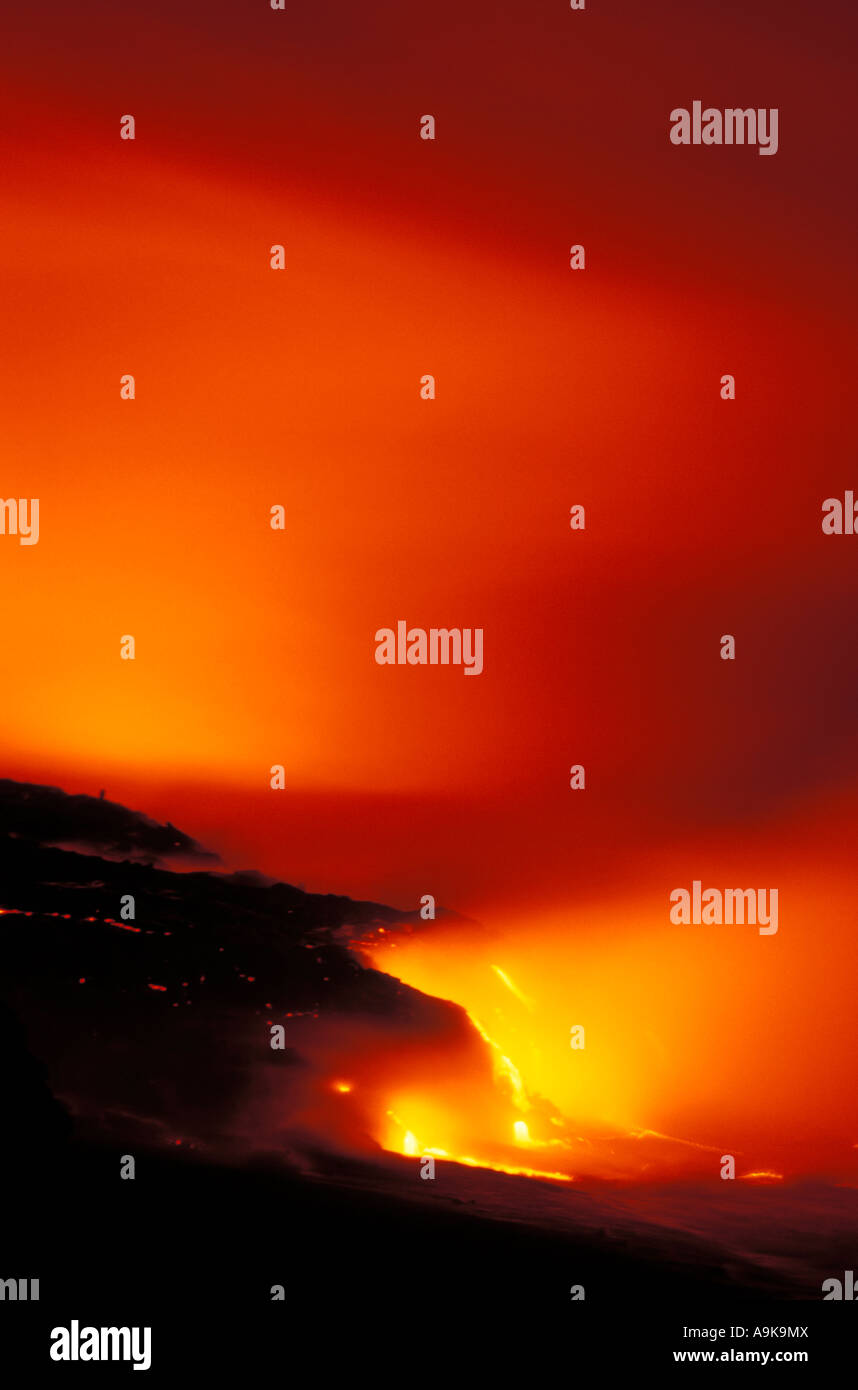 Lava flow entering the Pacific Ocean at night Hawaii Volcanoes National Park The Big Island ...