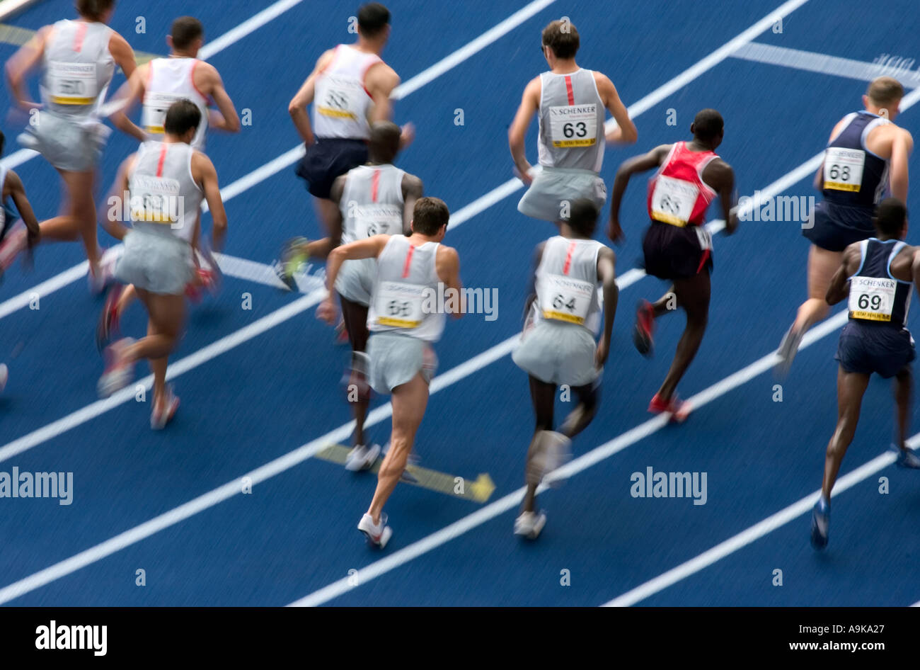 track and field competition on the blue lanes of the olympic stadium in ...
