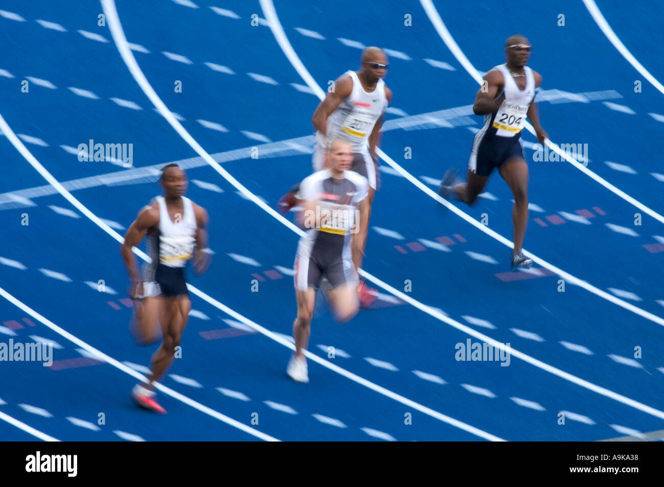 track and field competition on the blue lanes of the olympic stadium in ...