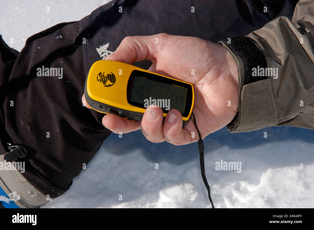Hand holding a GPS Global Positioning System device Los Padres National ...