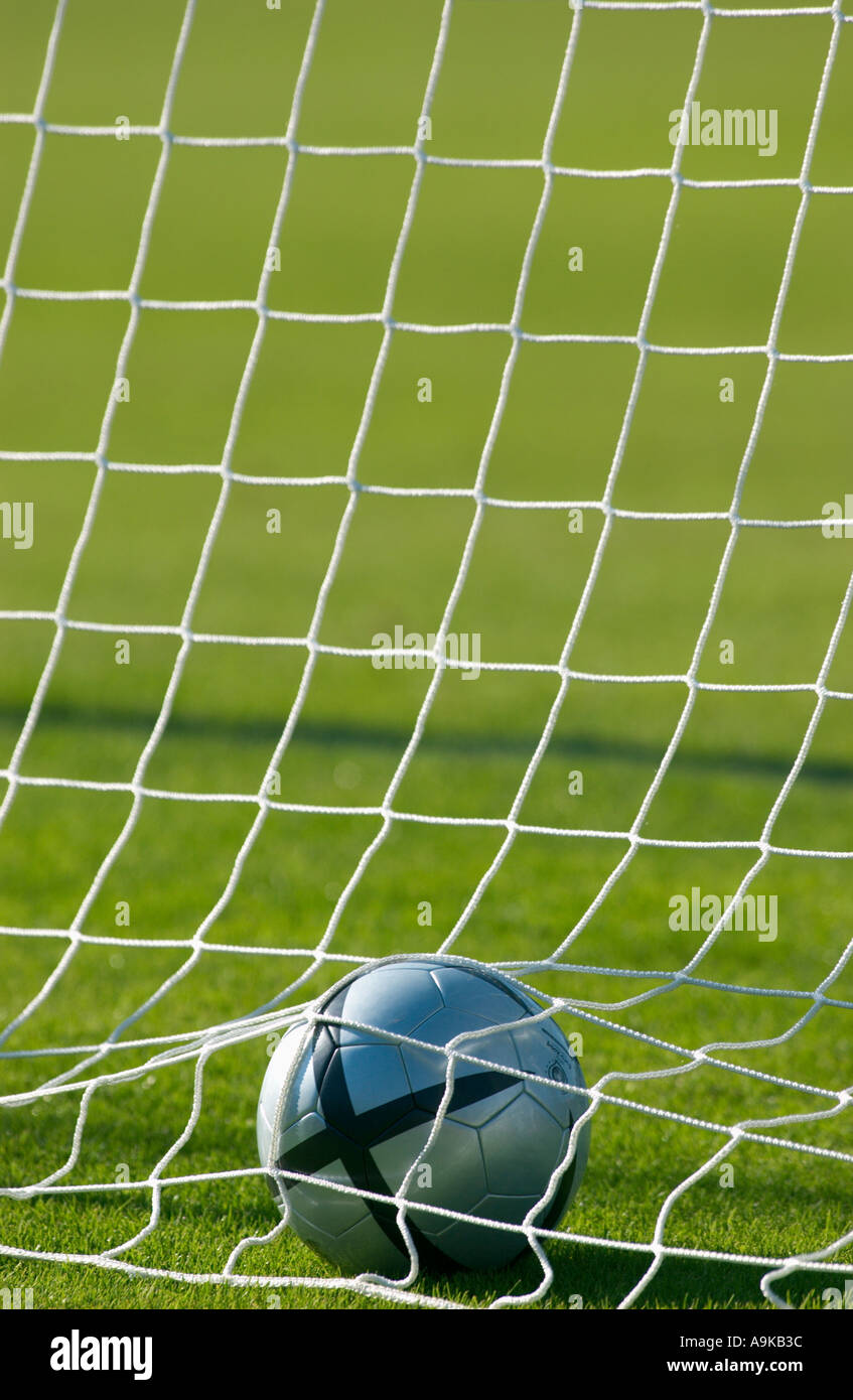 Soccer ball goal net Stock Photo - Alamy