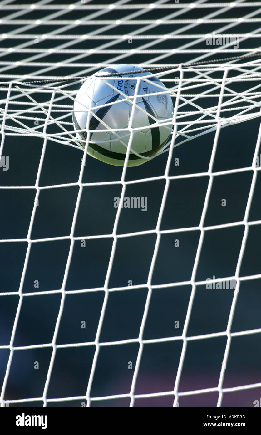 Soccer ball goal net Stock Photo - Alamy