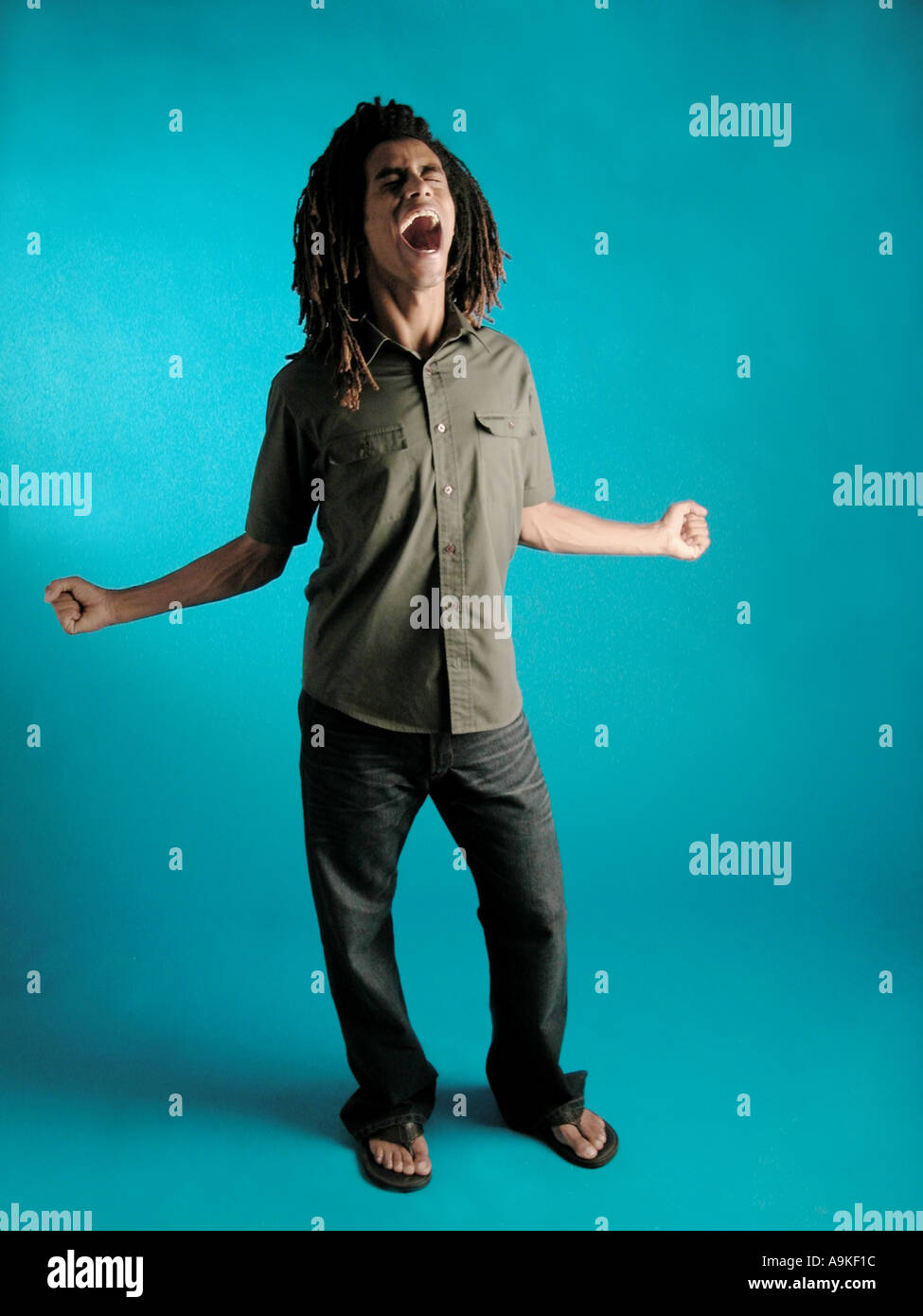 Black man dreadlocks yelling screaming hi-res stock photography and ...
