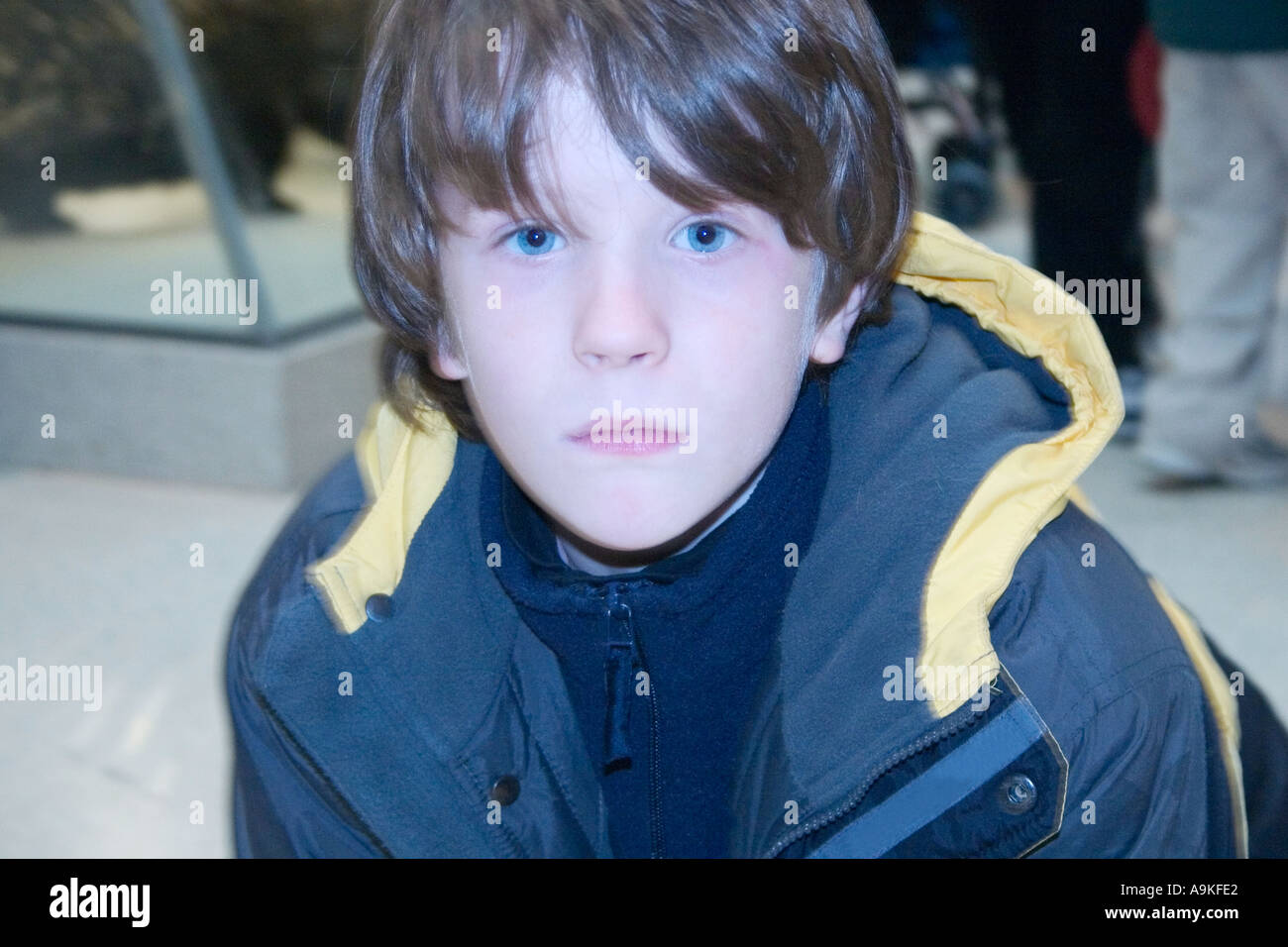 Boy age 10 in a winter jacket portrait Stock Photo - Alamy