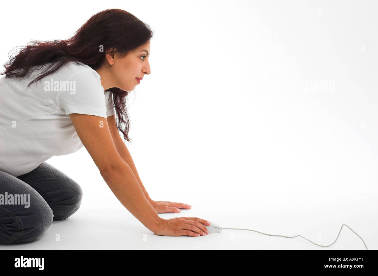 Young woman searching for something Concept with retro computer mouse ...