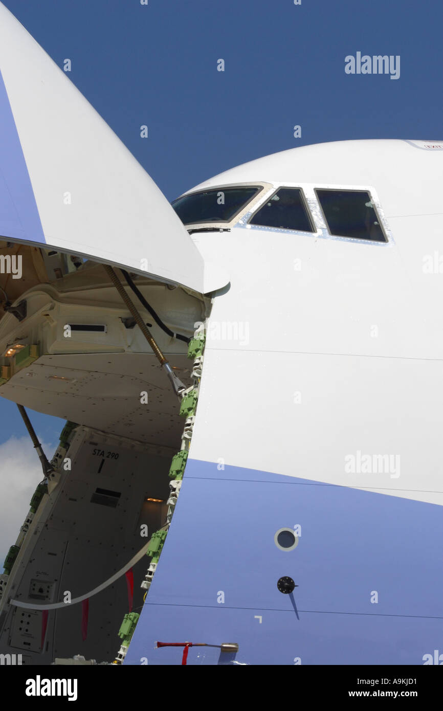 Cargo plane Boeing 747 freighter with nose open for loading Stock Photo ...