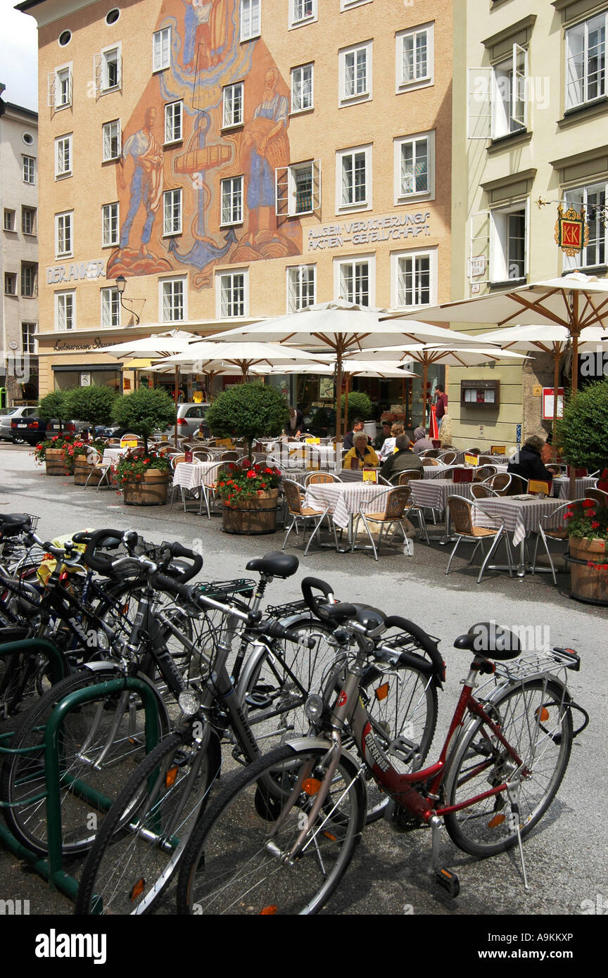 Cafe and wall painting Mozart Square Salzburg Austria Stock Photo - Alamy