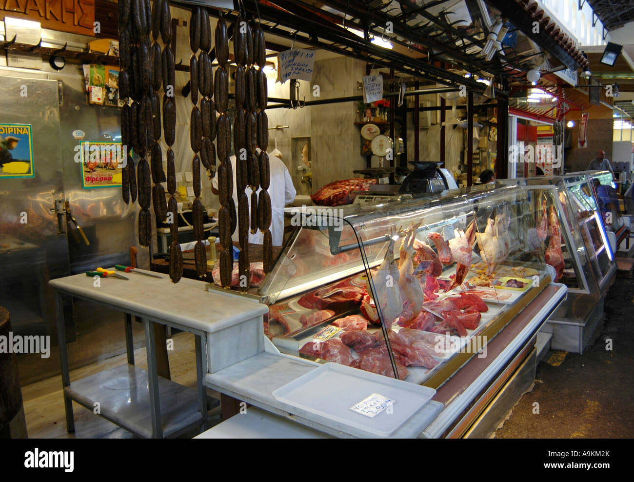 Butchers stall in the main street market Chania Crete Stock Photo - Alamy