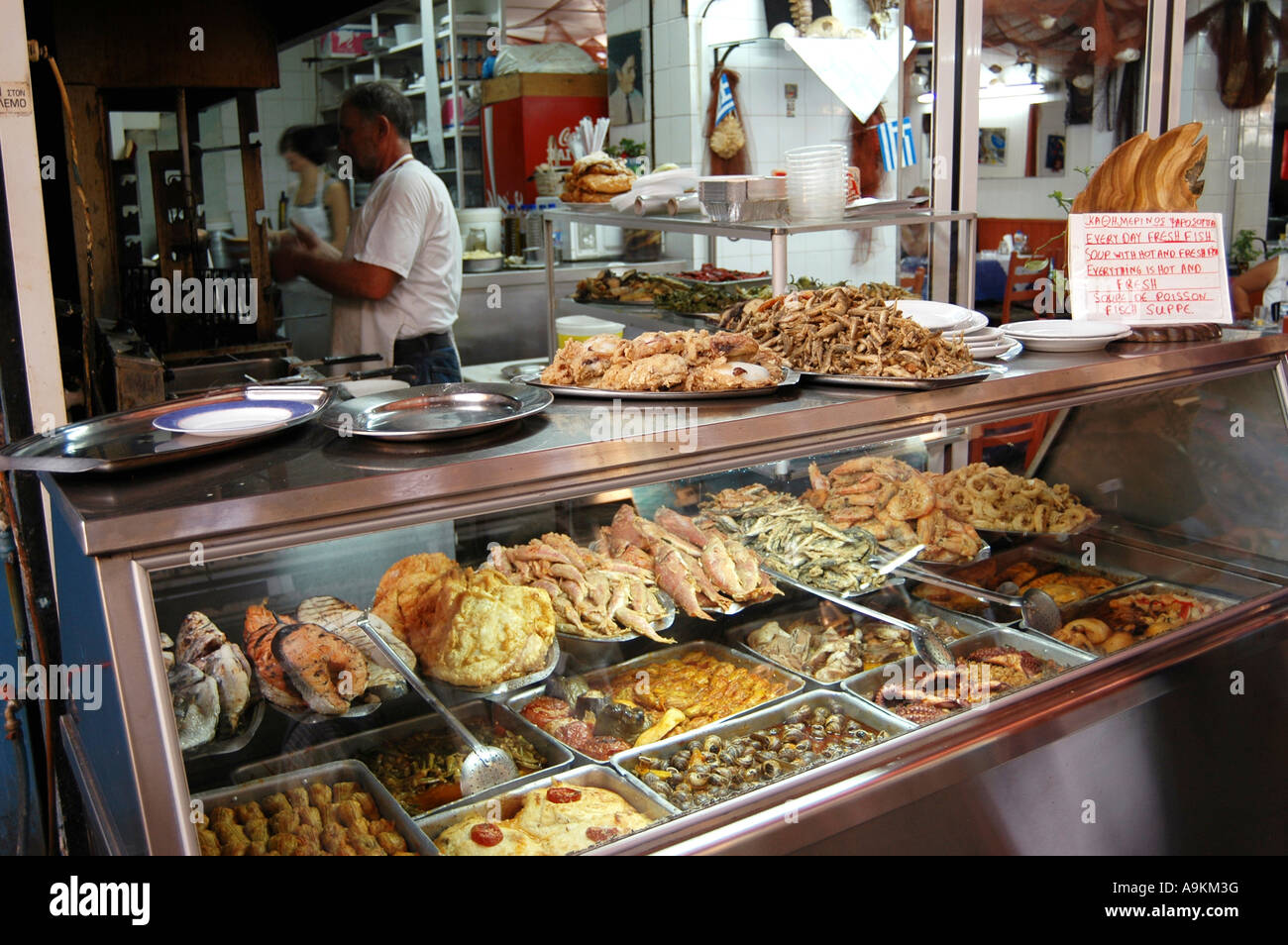 Fried and cooked fish stall in local street market Chania Crete Stock ...
