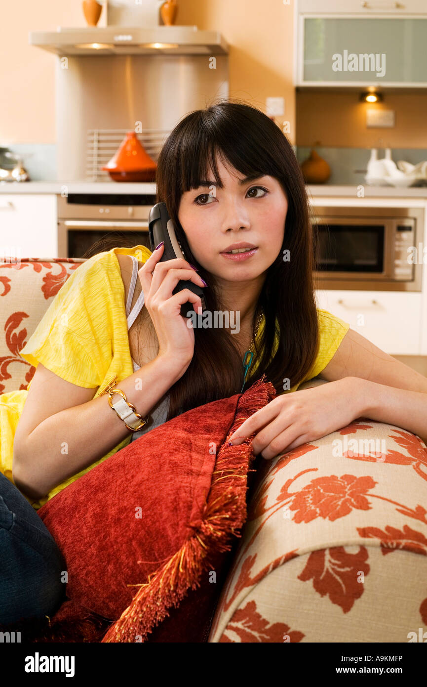 chatting on a telephone at home Stock Photo - Alamy