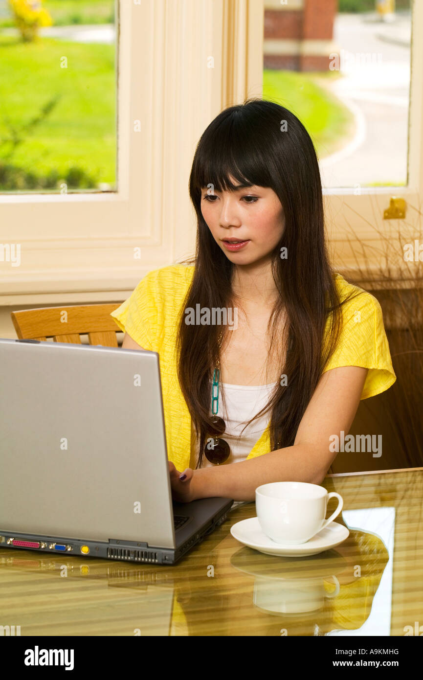 woman working from home in her apartment Stock Photo - Alamy