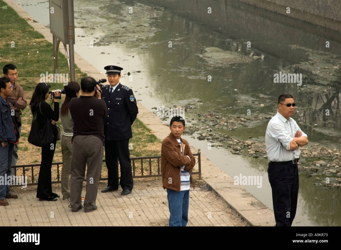 CHINESE POLICE CHIEF GIVING INTERVIEW TO LOCAL JOURNALISTS ABOUT ...