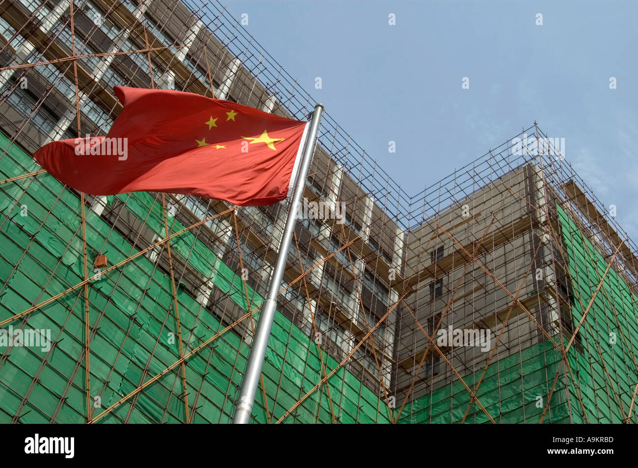 CHINESE FLAG ON CONSTRUCTION SITE FOR A NEW SHOPPING MALL AND OFFICE ...