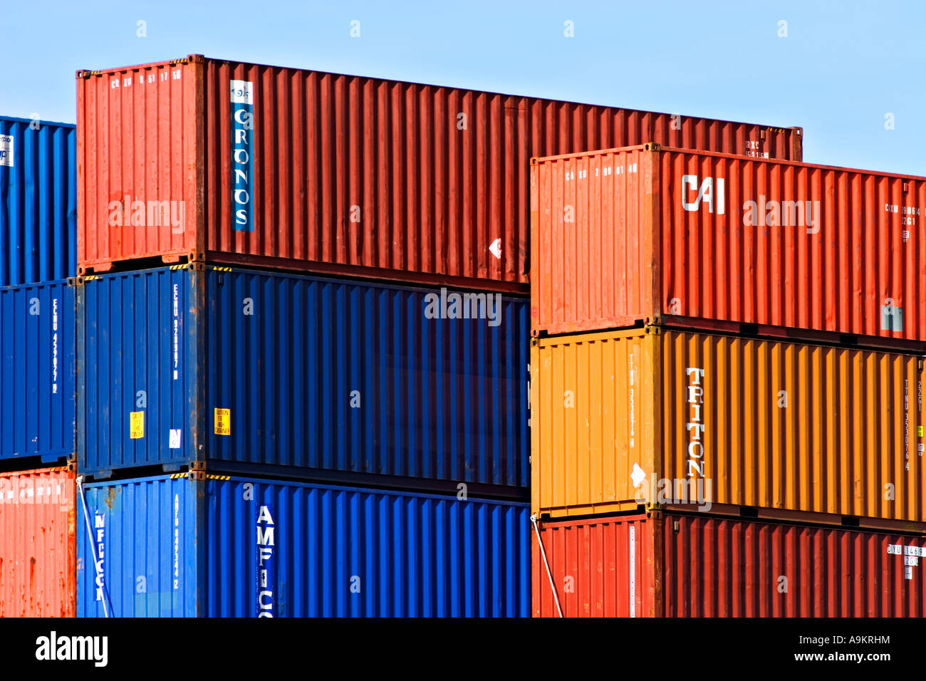 Shipping Industry / Shipping containers stacked on the deck of a ship ...