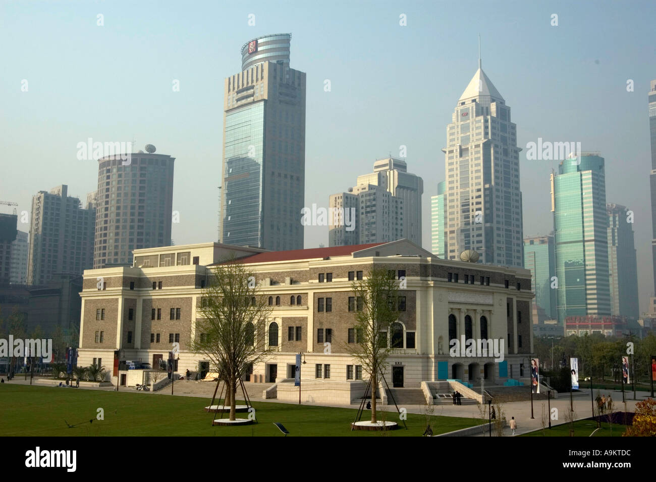 SHANGHAI CONCERT HALL WITH SHOPPING MALL AND TOP END HOTEL SKYLINE ...