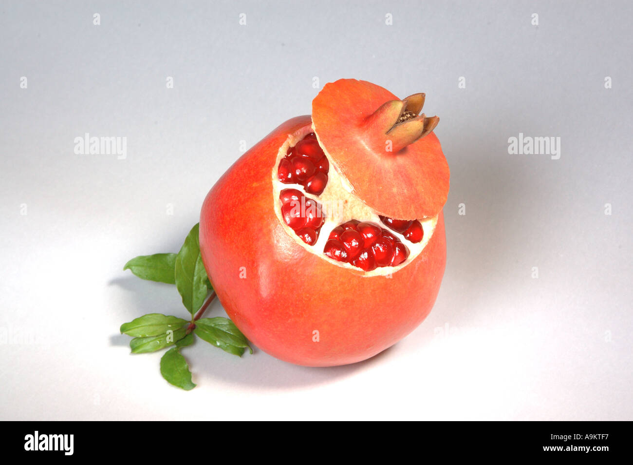 pomegranate fruit cut red seeds on white background Dalim Punica ...