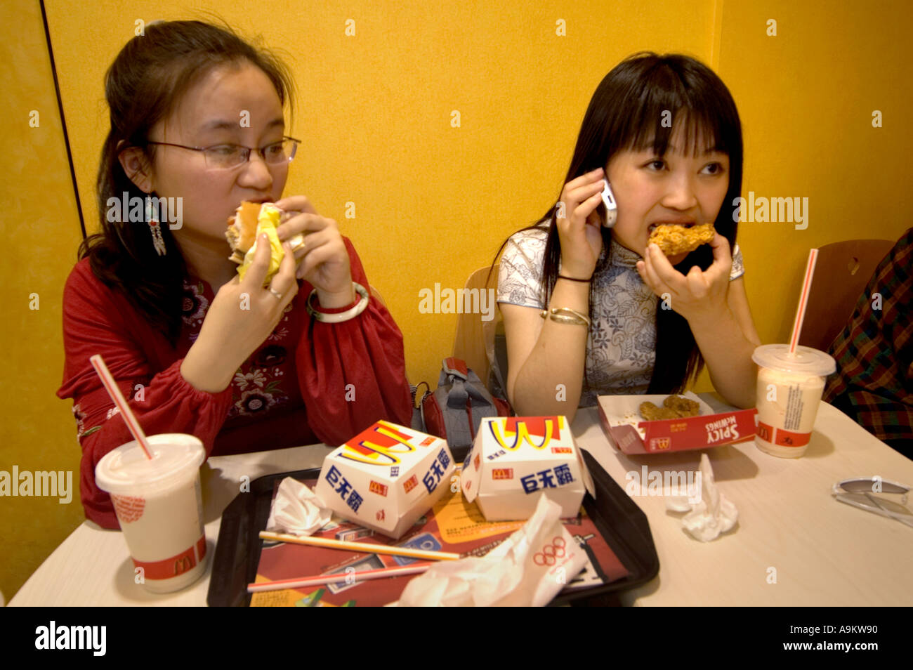 MODEL RELEASED YOUNG MIDDLE CLASS CHINESE WOMEN EATING LUNCH AT ...