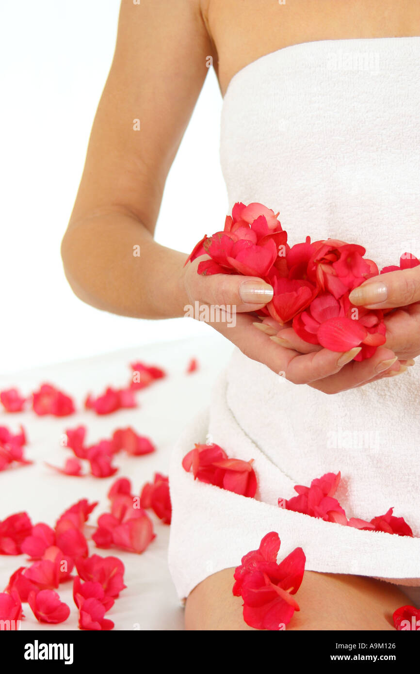 Petals falling hand hi-res stock photography and images - Alamy