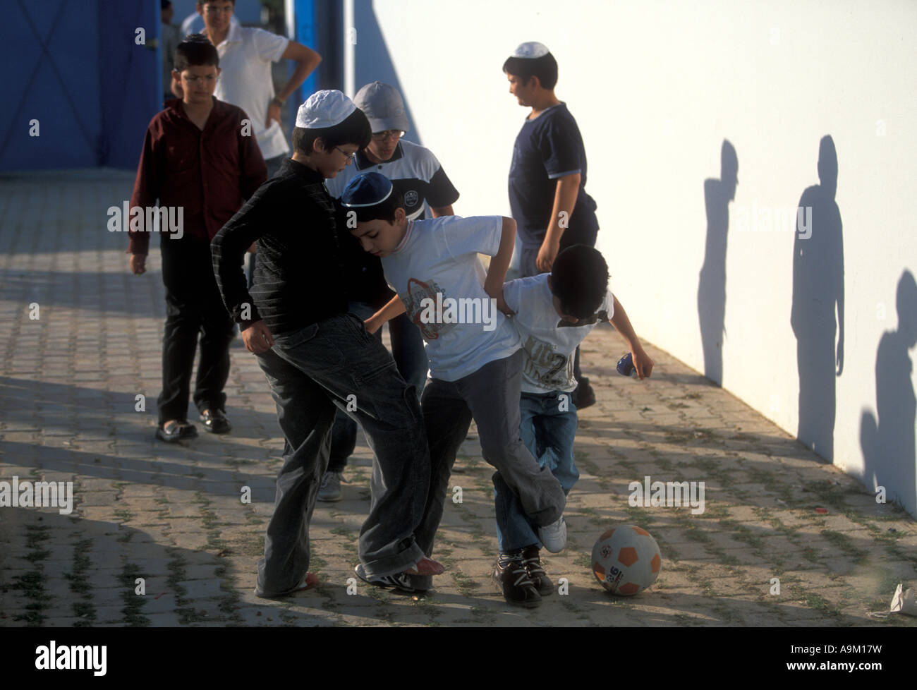 Jewish children playing football at the La Griba synagogue Djerba Stock ...