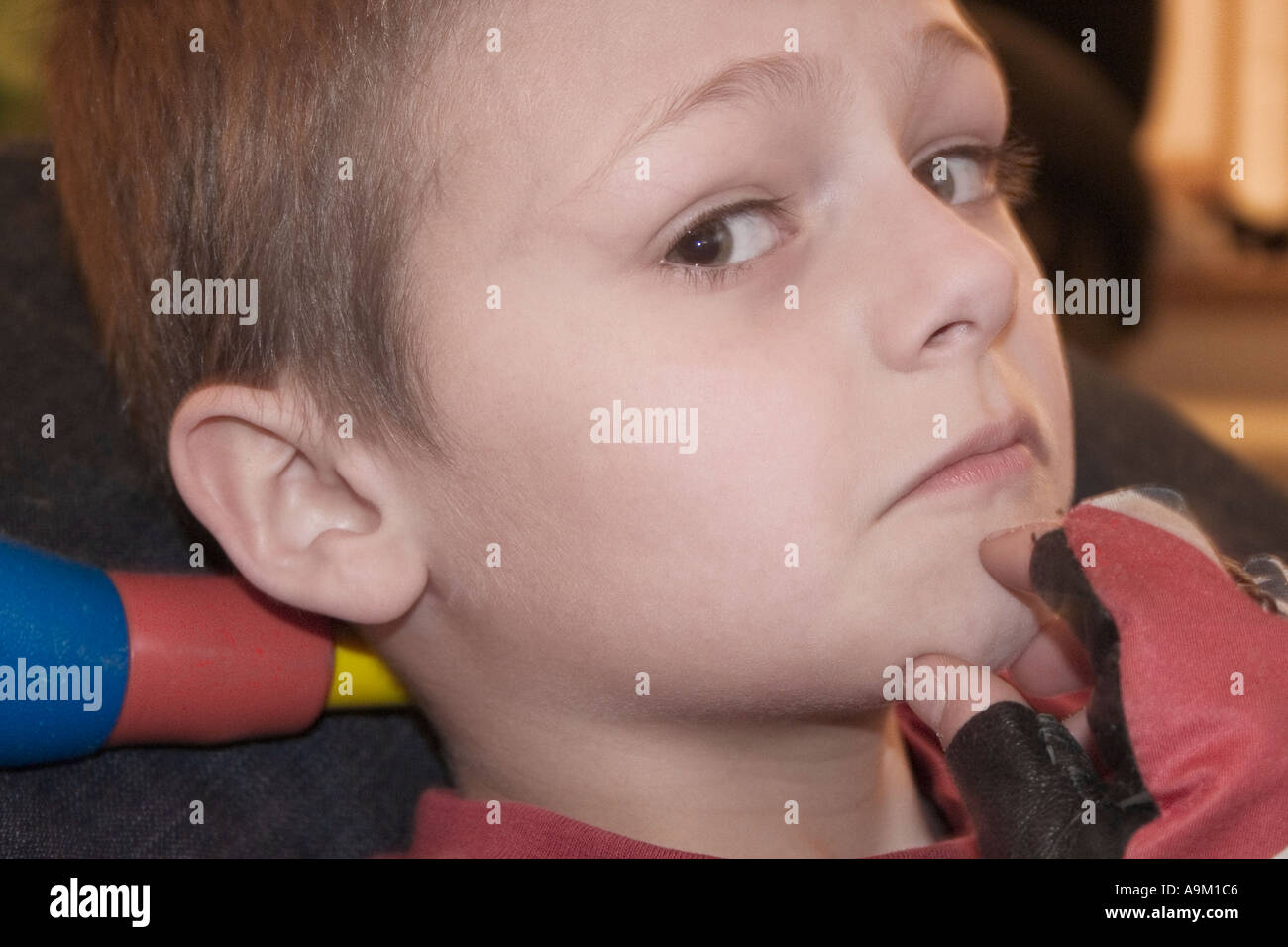 Boy age 8 making funny face Stock Photo - Alamy