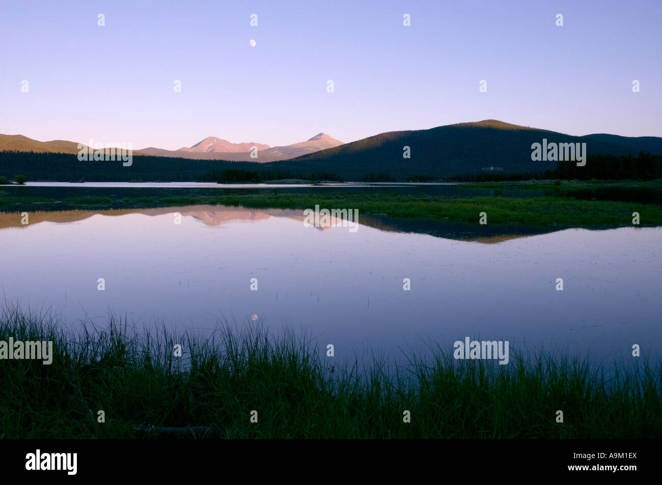 moonrise over Dillon Lake and mountains in Colorado Stock Photo - Alamy