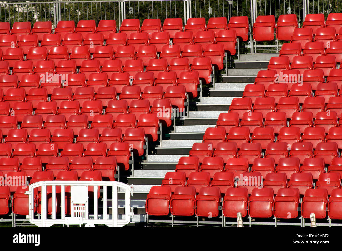 Patterns formed by rows of seats on an arena stand Stock Photo - Alamy