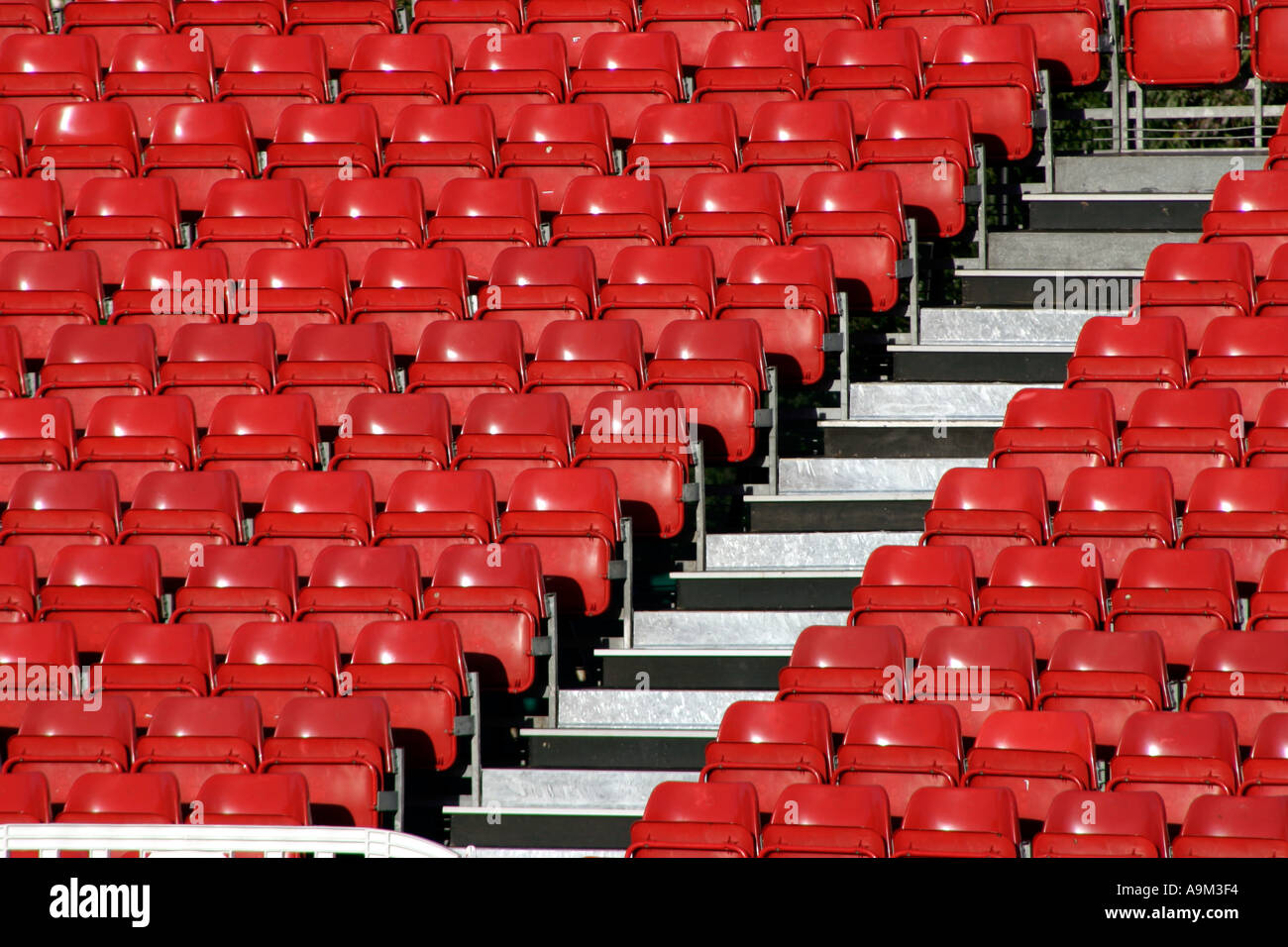 Patterns formed by rows of seats on an arena stand Stock Photo - Alamy