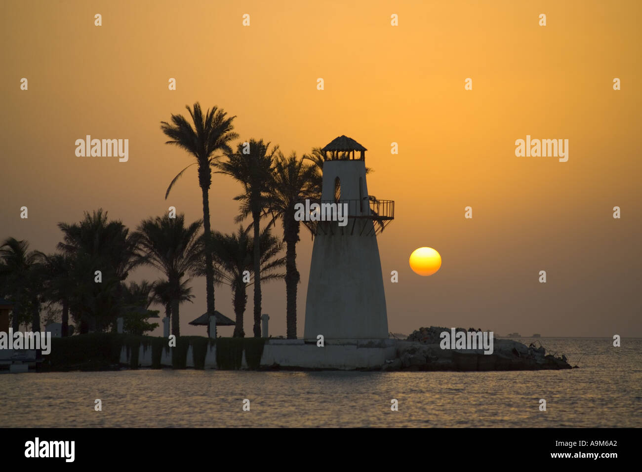 Abu Dhabi United Arab Emirates Futaisi Island Palm Trees and Lighthouse ...
