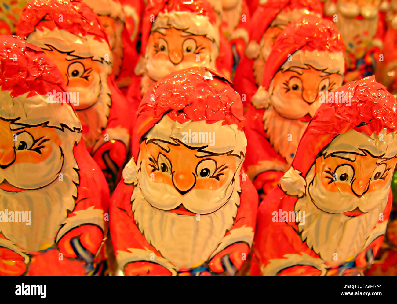 many Santa Clauses made of chocolate Stock Photo - Alamy