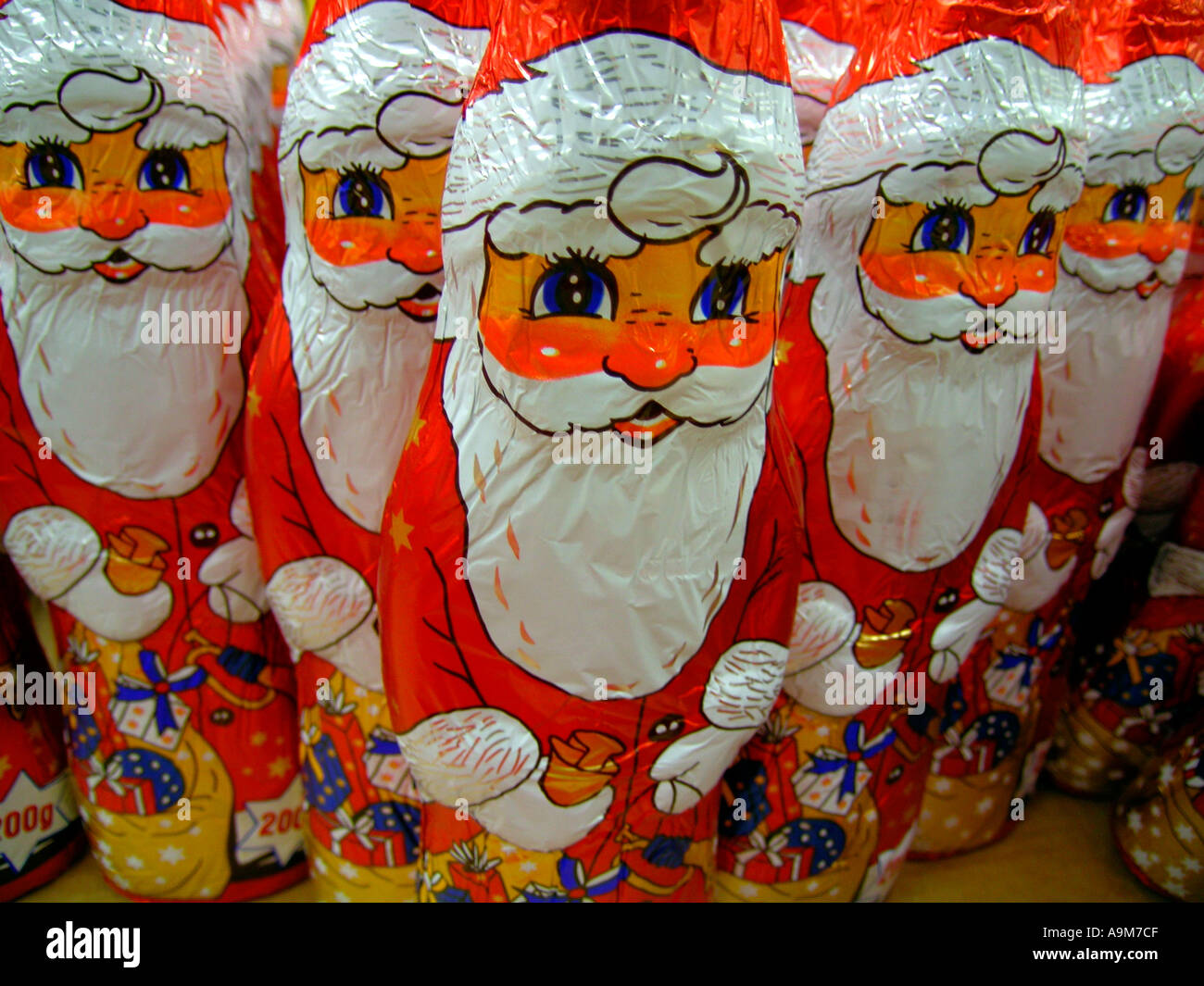 many Santa Clauses made of chocolate Stock Photo - Alamy