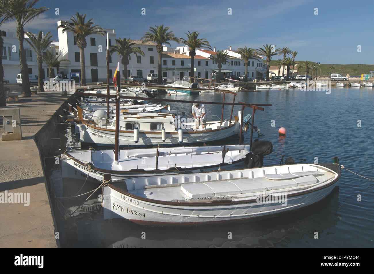 Fishing boats at fornells village hi-res stock photography and images ...
