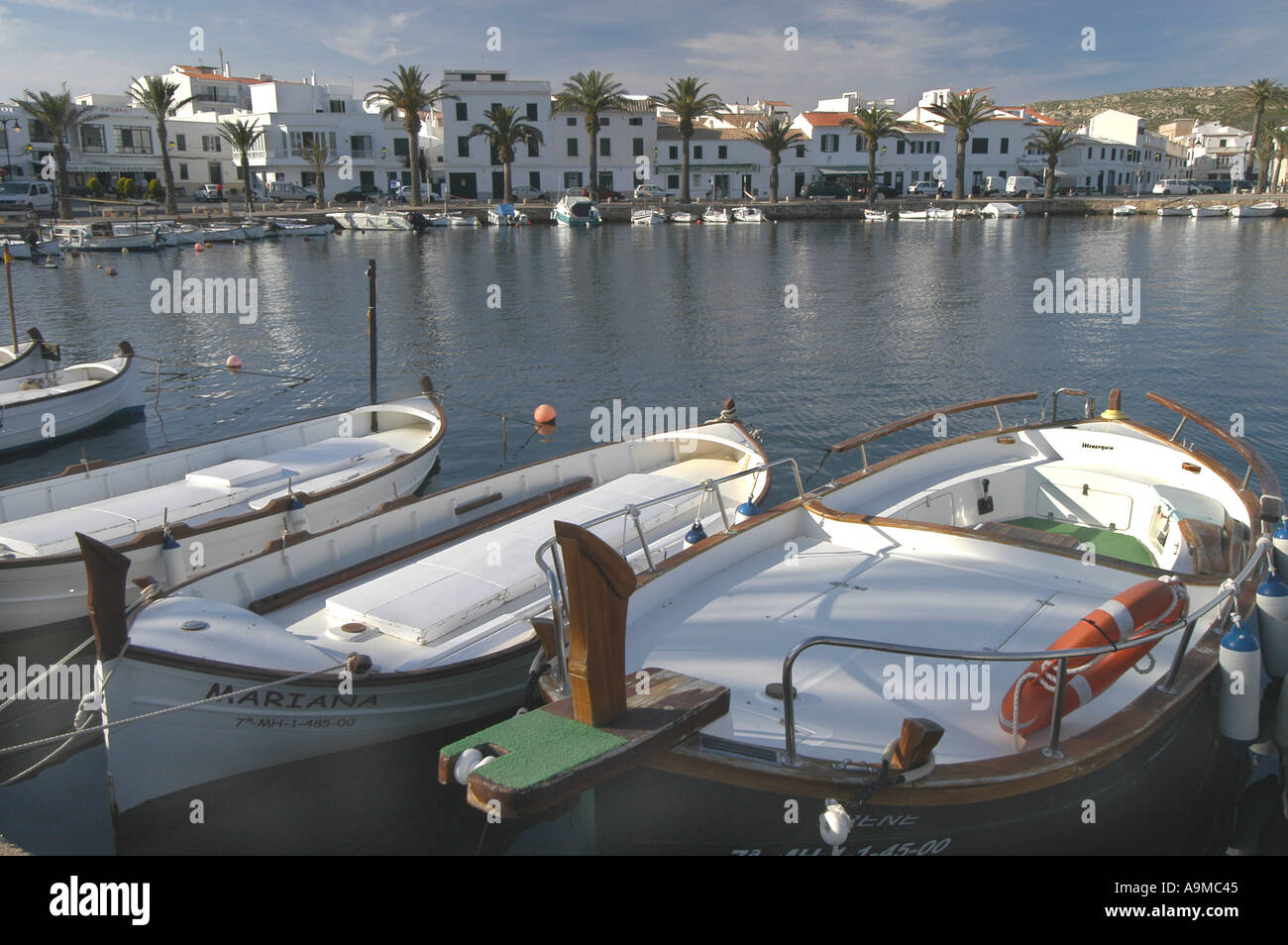 Fishing boats at fornells village hi-res stock photography and images ...