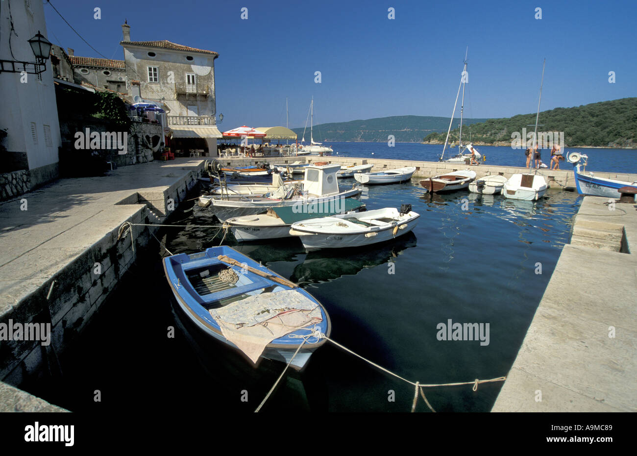 harbor in the historic center of Valun Stock Photo - Alamy