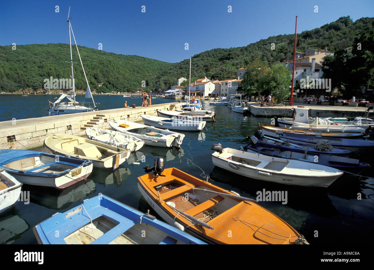 harbor in the historic center of Valun Stock Photo - Alamy