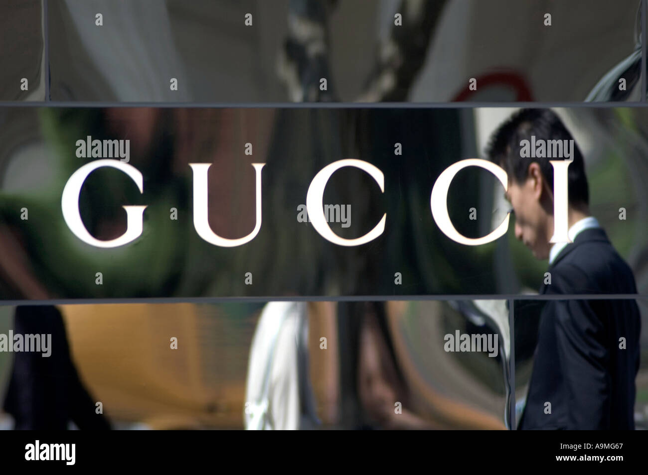 GUCCI SIGN IN UP MARKET SHOPPING AREA OF JINGAN SHANGHAI CHINA Stock ...