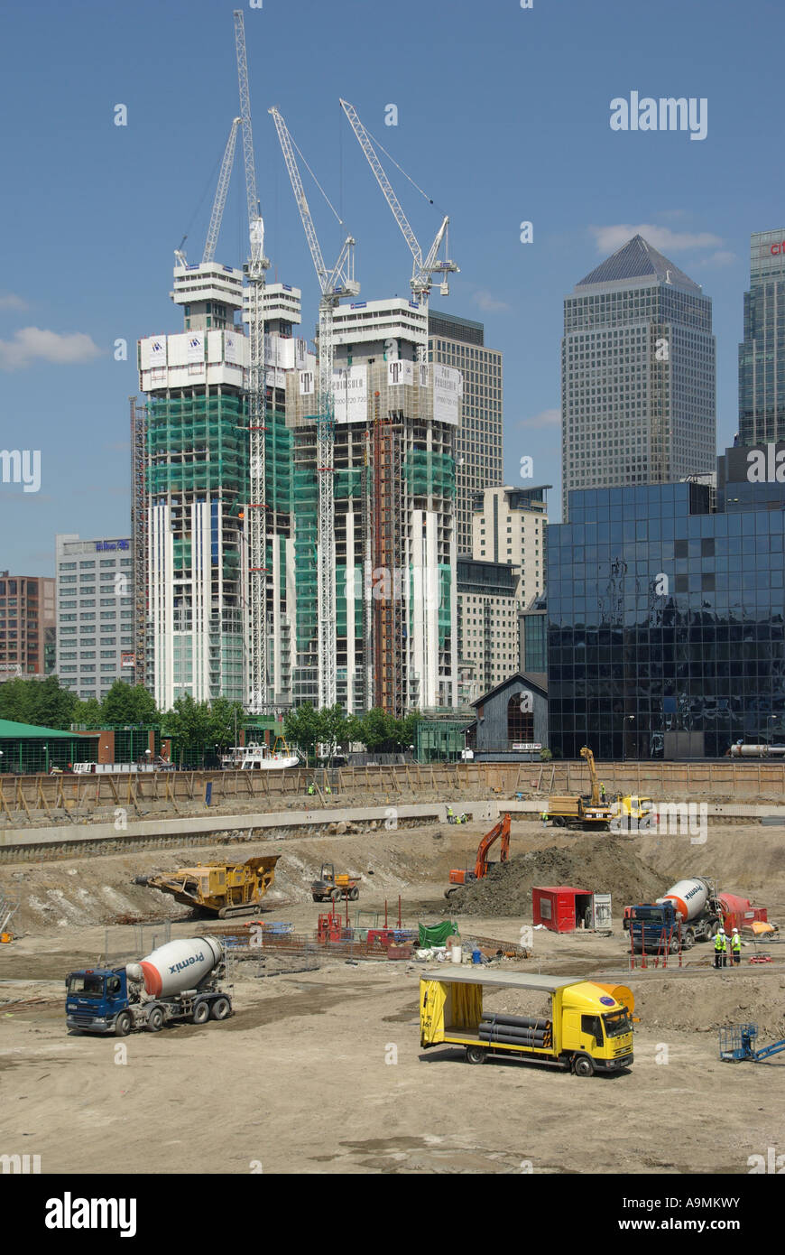 East London Docklands machines working on foundations with cranes ...
