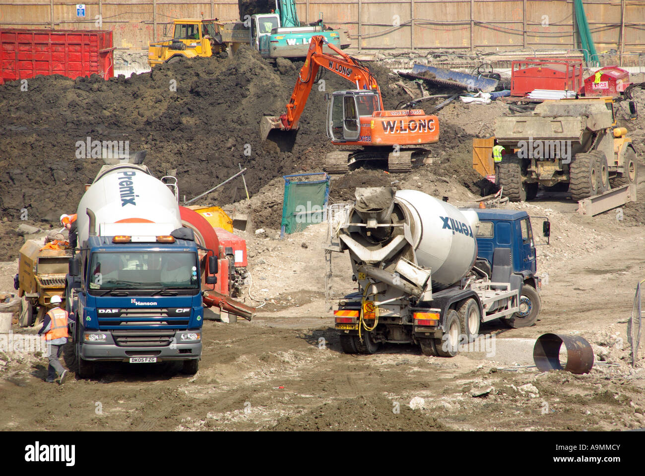 Busy construction site makes full use of machines for foundations ...