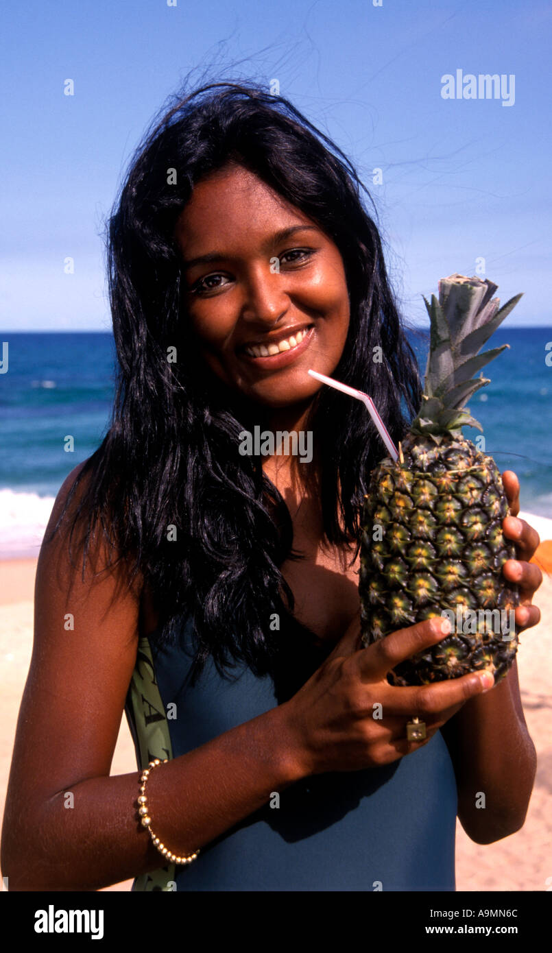 Beautiful Girl with Pineapple in Brazil Smile sea Stock Photo - Alamy