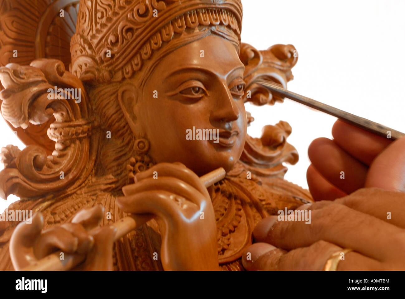 Carving carvings figure figures sculptors hi-res stock photography and ...