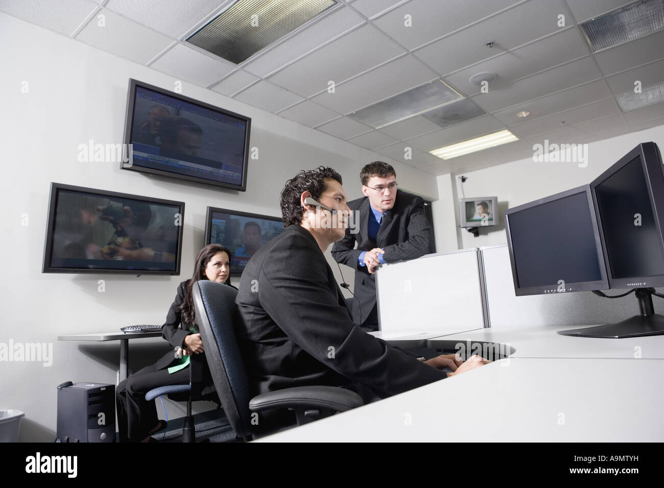 Business people working in a busy office Stock Photo - Alamy