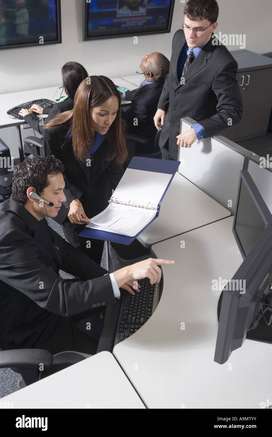 Business people working together in a busy office Stock Photo - Alamy
