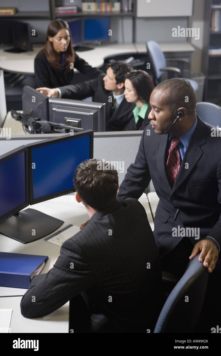 Business people working in a busy office Stock Photo - Alamy