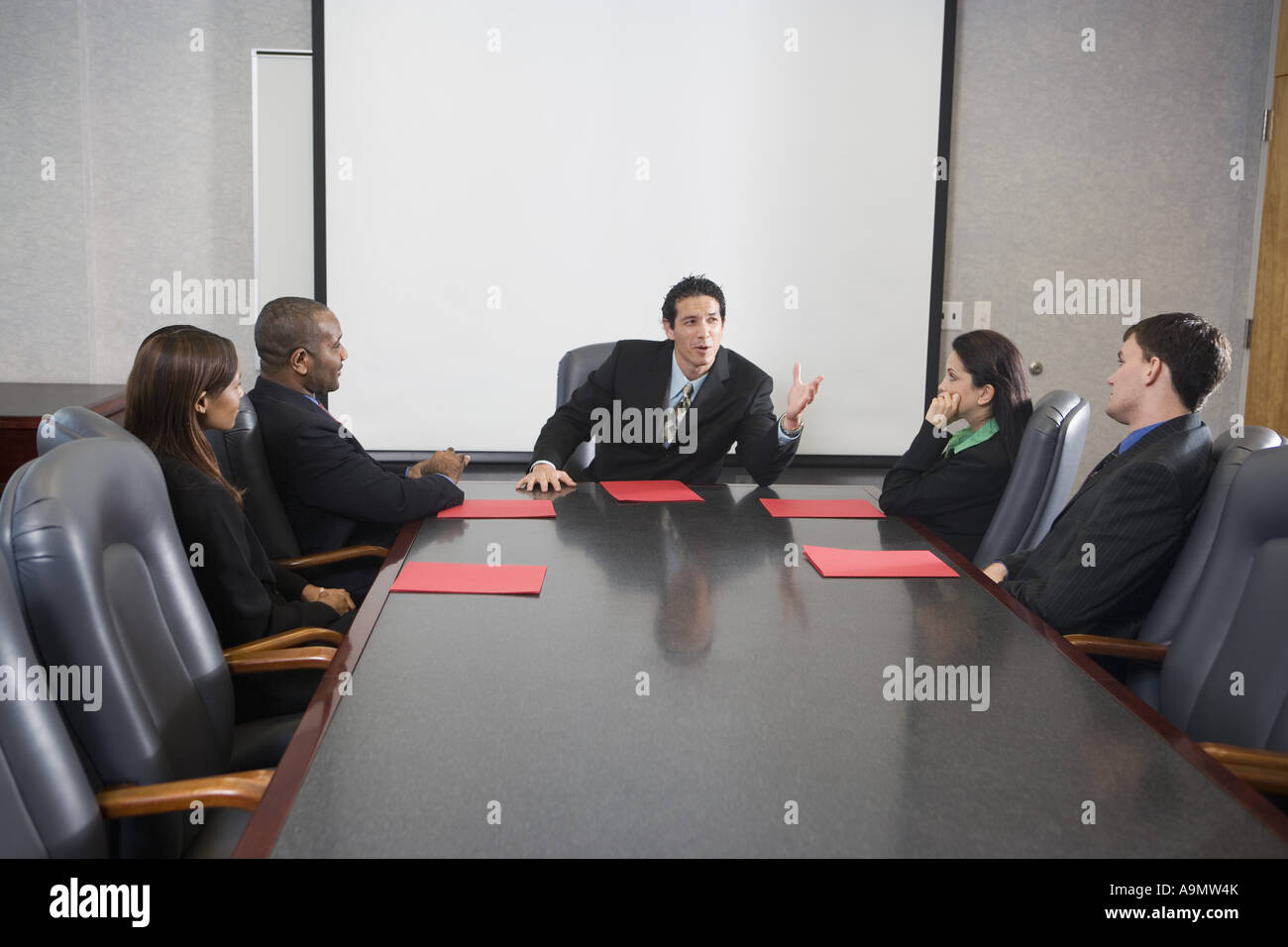Men only meeting table suits hi-res stock photography and images - Alamy